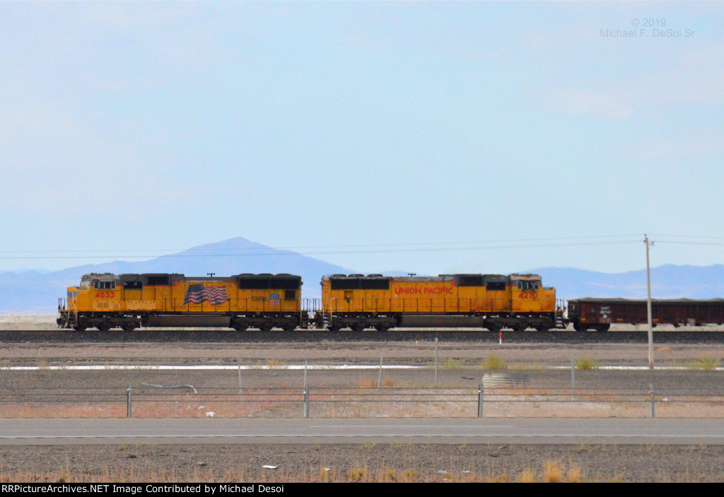 UP SD-70Ms #s 4833 & 4270 lead the eastbound LUE20-19 at the Bonneville Salt Flats in Wendover ...